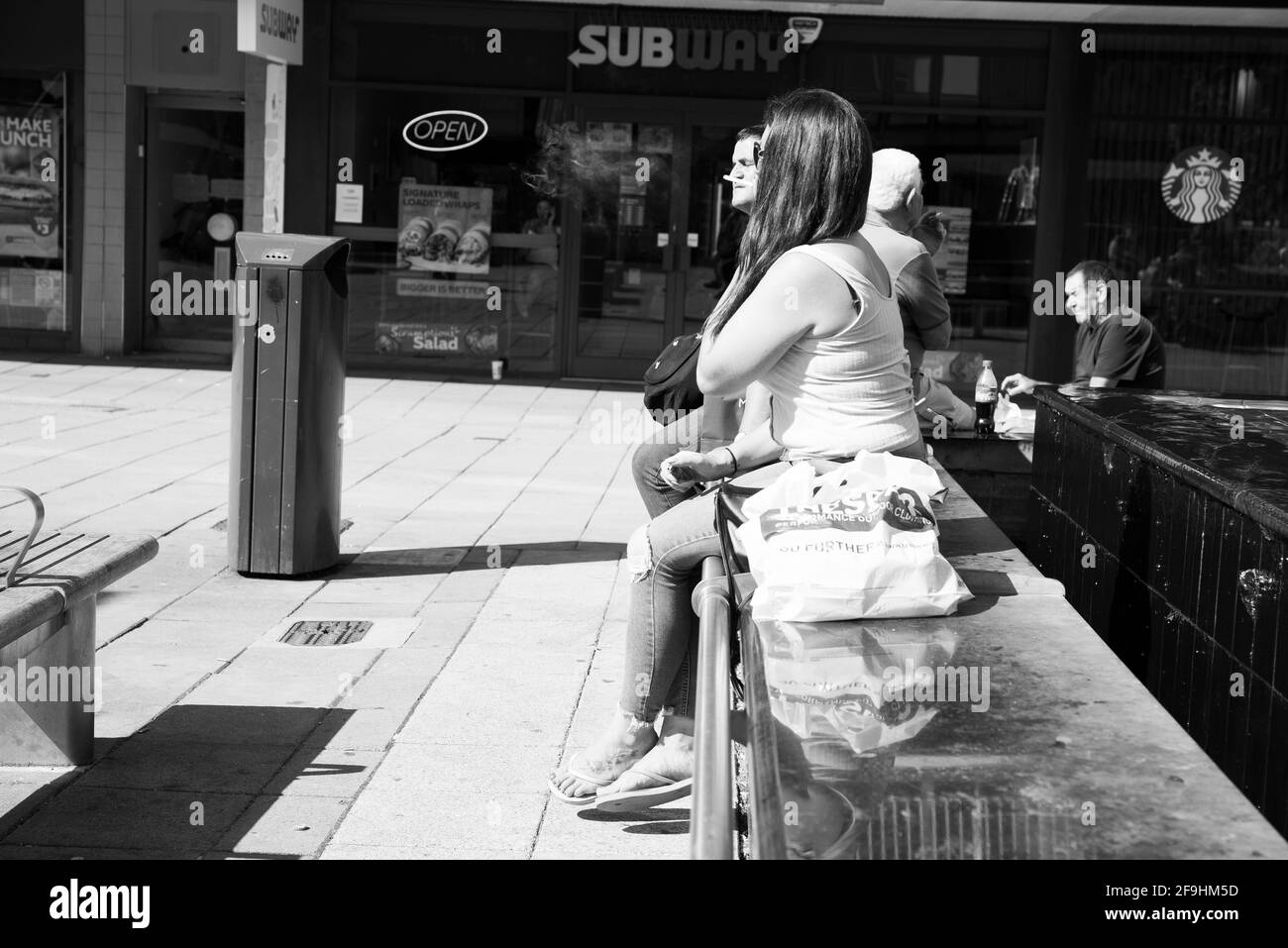 Street life of every day People around Town carrying out normal lives ...