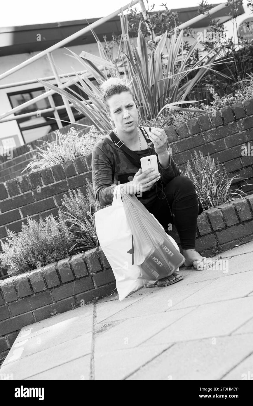 Street life of every day People around Town carrying out normal lives ...