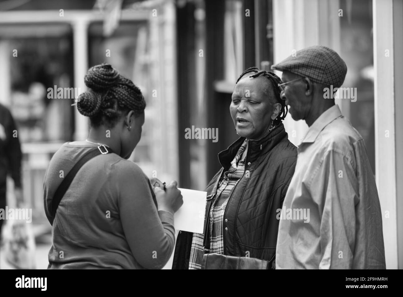 Street life of every day People around Town carrying out normal lives ...