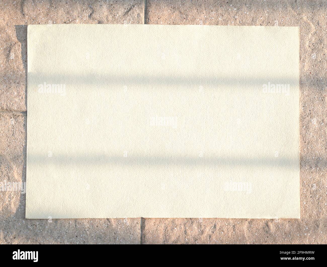 Empty beige paper on top of rustic texture background. Line of shadows ...