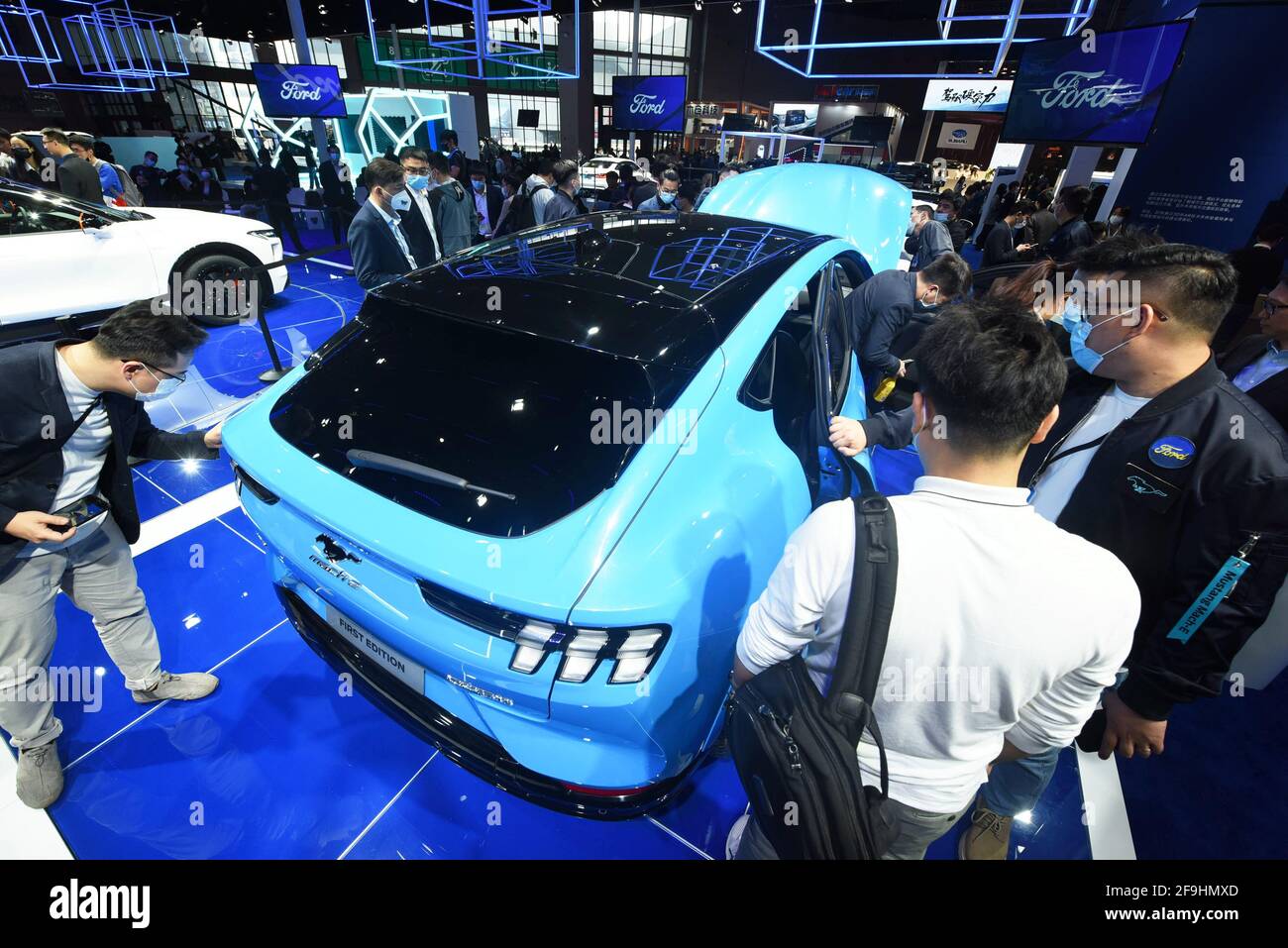 SHANGHAI, CHINA - APRIL 19, 2021 - Visitors look at a new Chinese-made ...