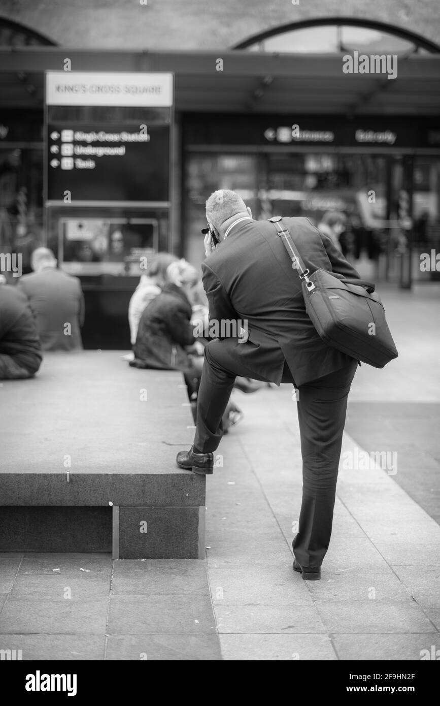 Street life of every day People around Town carrying out normal lives ...