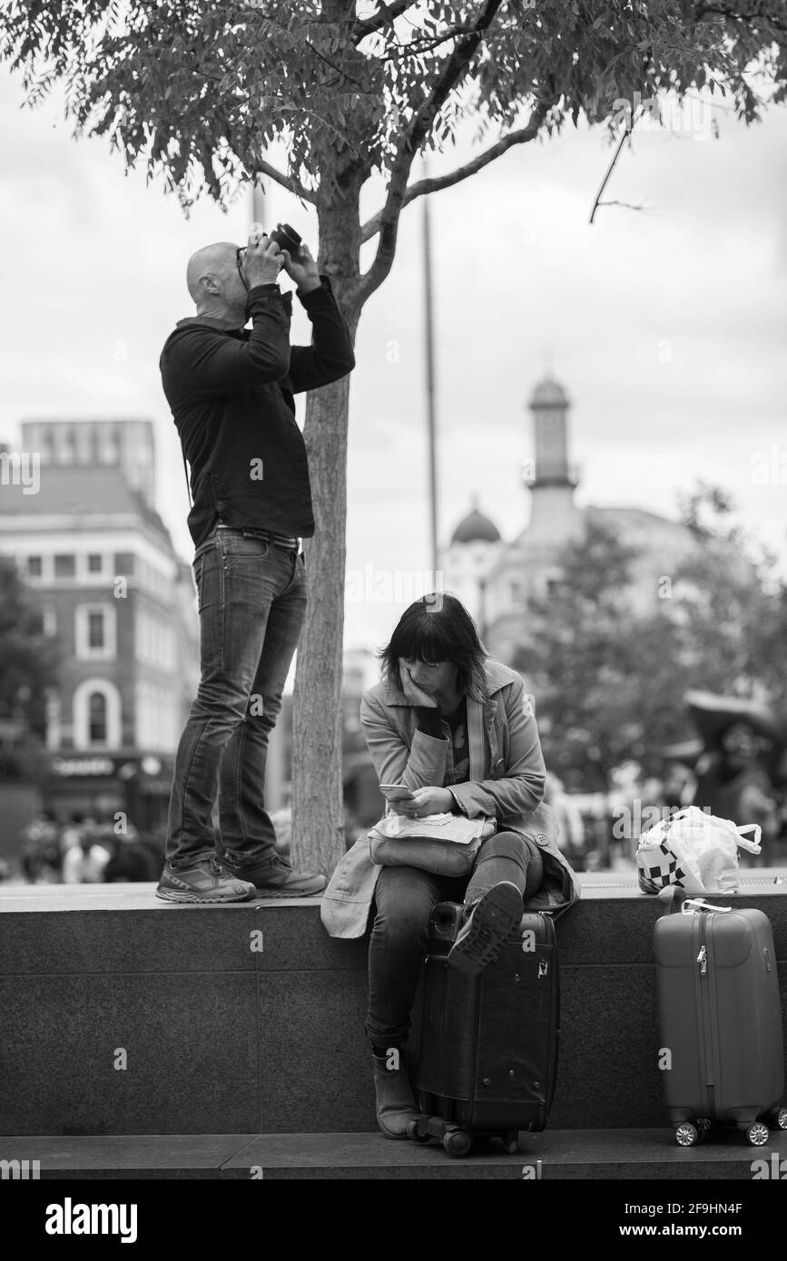 Street life of every day People around Town carrying out normal lives ...