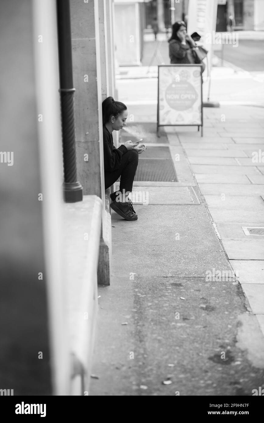 Street life of every day People around Town carrying out normal lives ...