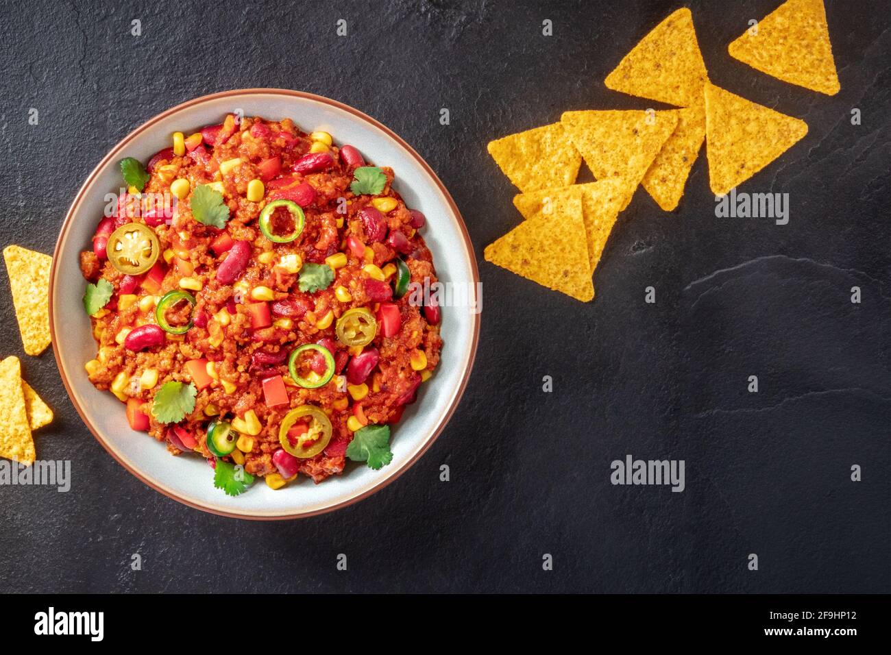 Chilli con carne, colorful stew with meat and vegetables Stock Photo ...