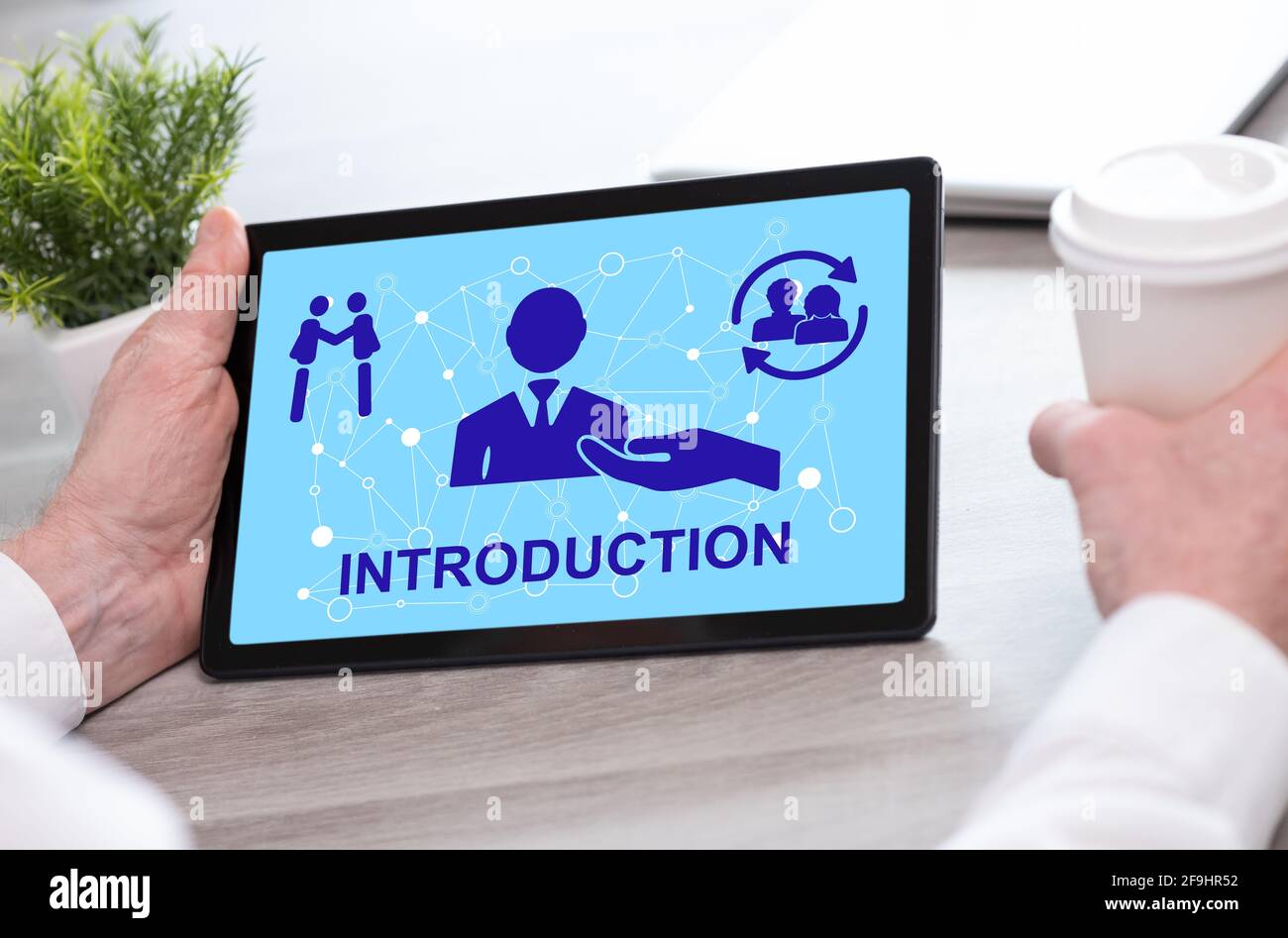 Tablet screen displaying an introduction concept Stock Photo - Alamy