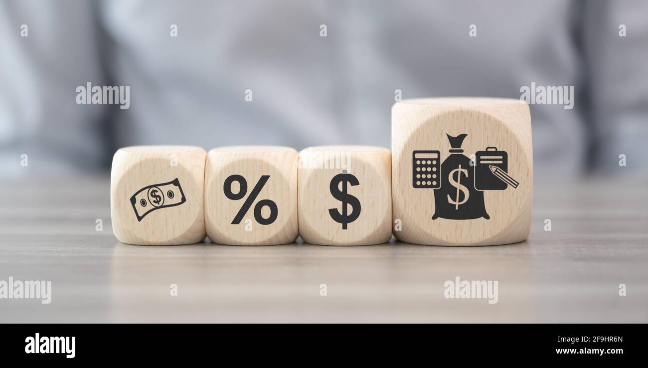Wooden blocks with symbol of money management concept Stock Photo - Alamy
