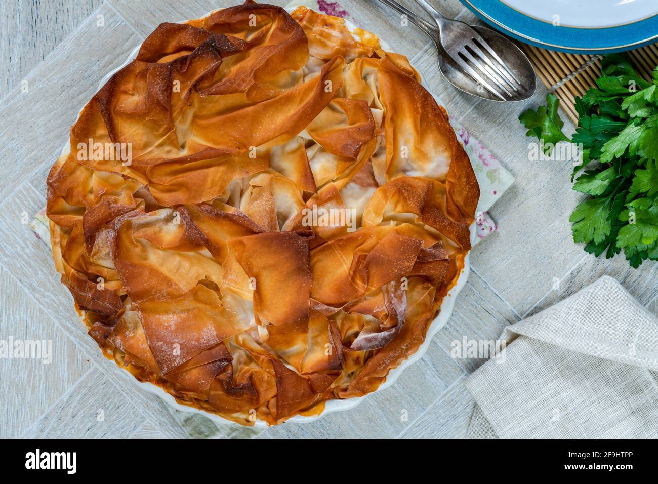 Filo-topped fish pie with halibut, sea bass and king prawns - overhead ...