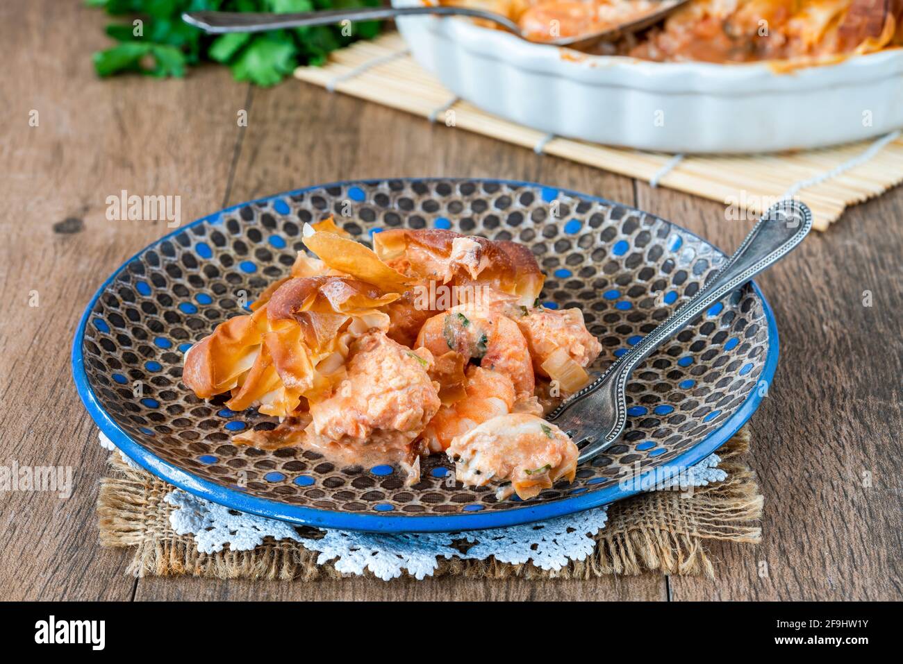Filo-topped fish pie with halibut, sea bass and king prawns Stock Photo ...