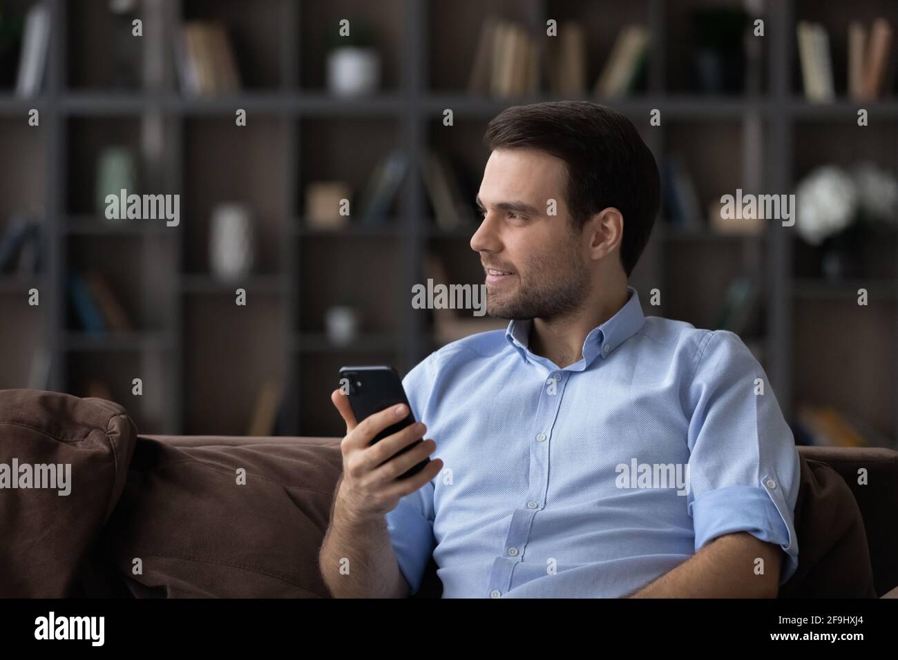 Happy people looking cell hi-res stock photography and images - Alamy