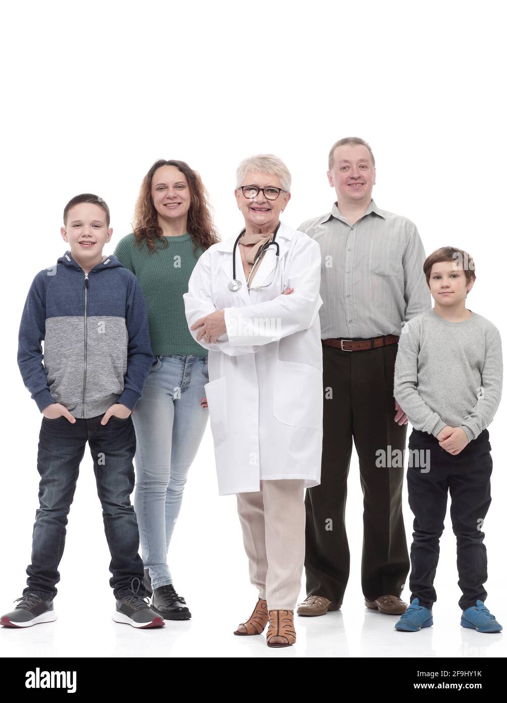 happy family and their family doctor standing together Stock Photo - Alamy