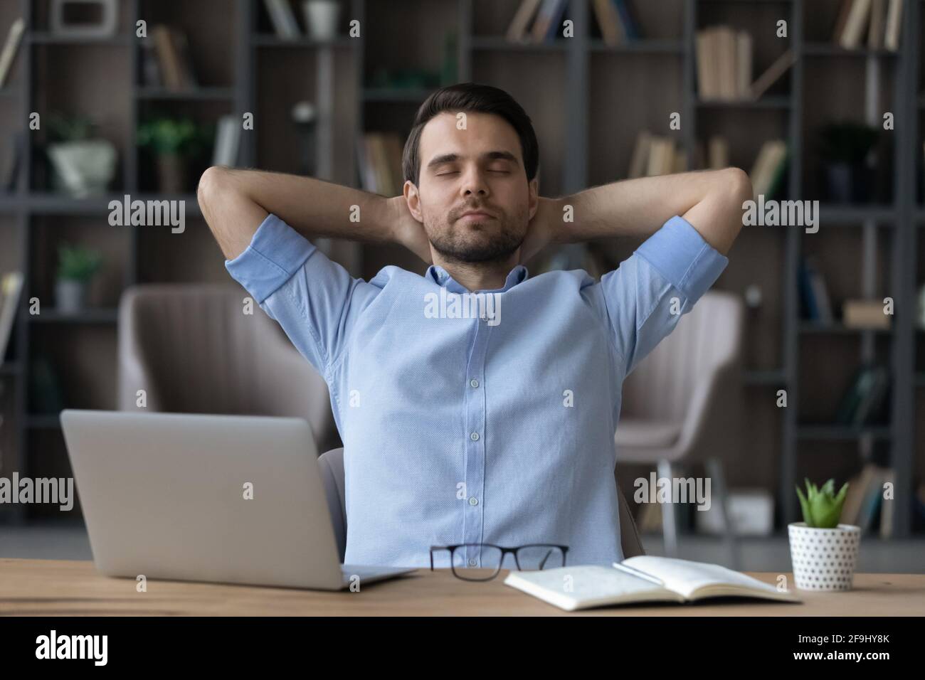 Man asleep in chair hi-res stock photography and images - Alamy