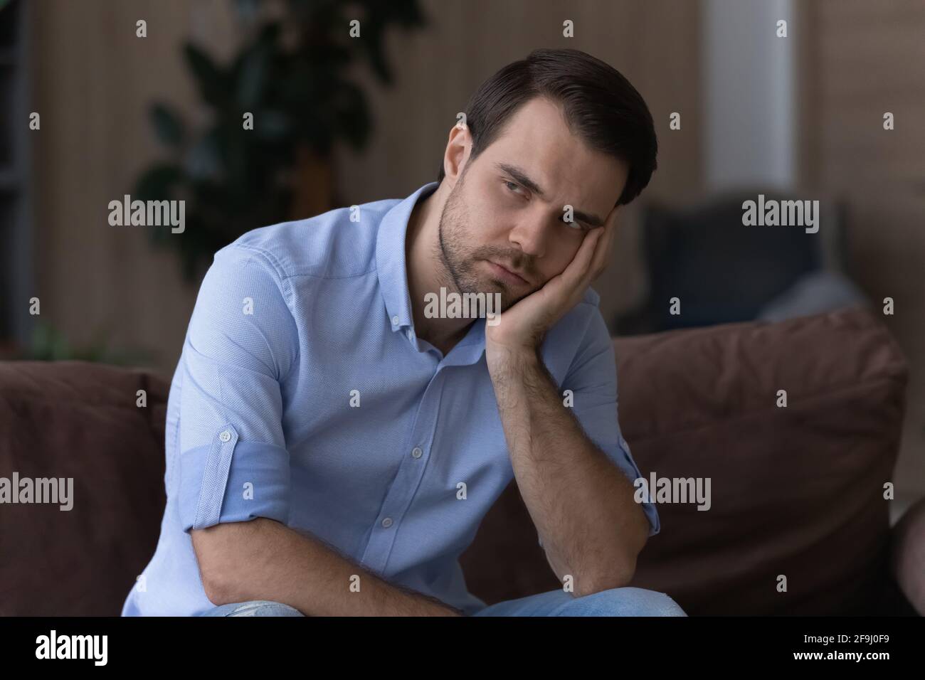 Man bored at home hi-res stock photography and images - Alamy