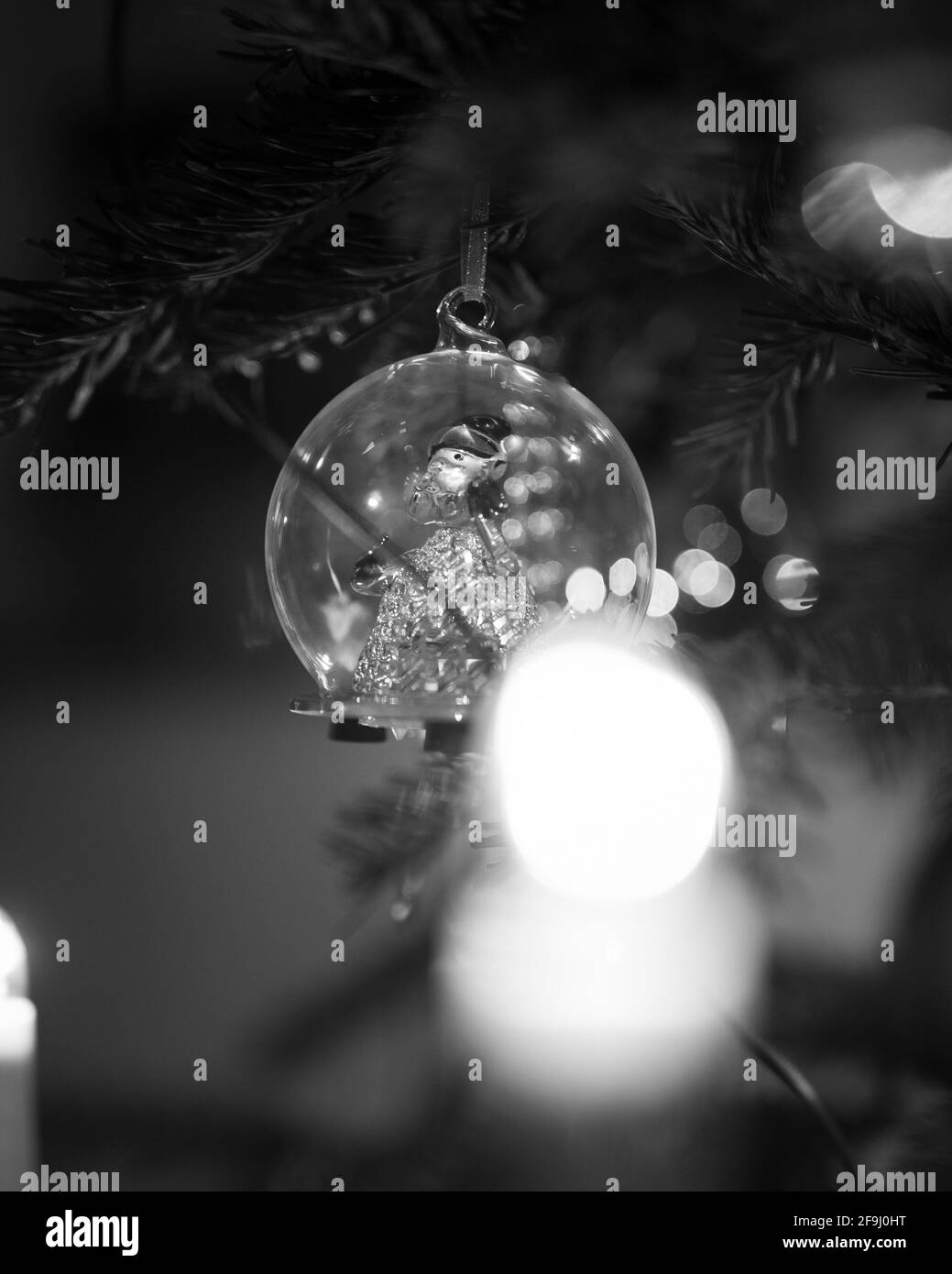 Vertical greyscale shot of a transparent bauble Stock Photo - Alamy