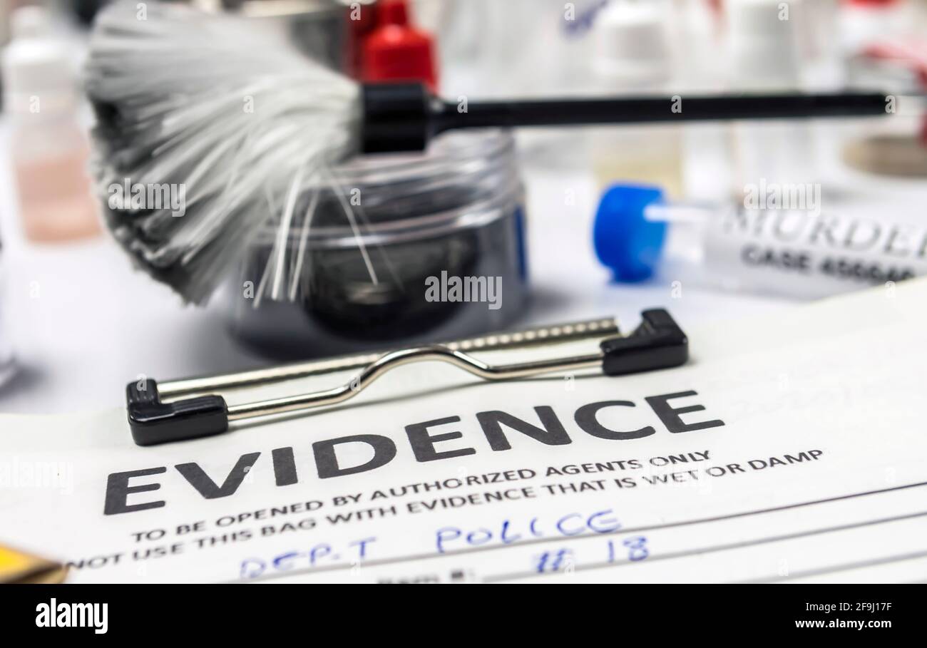 Evidence bag, Police scientific laboratory, conceptual image, vertical ...