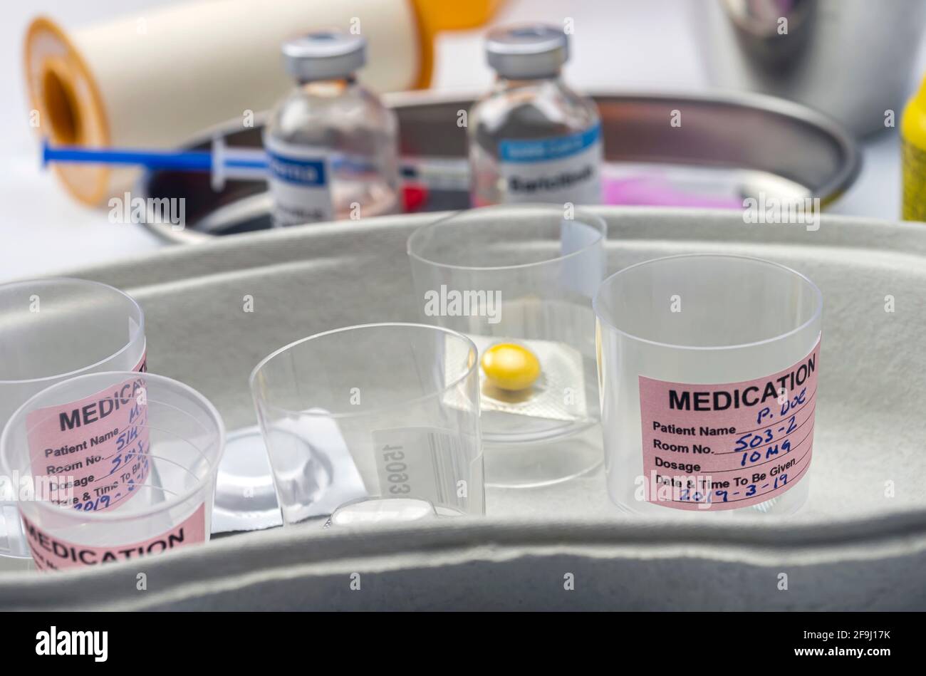 Different dosage medication in hospital, conceptual image Stock Photo ...