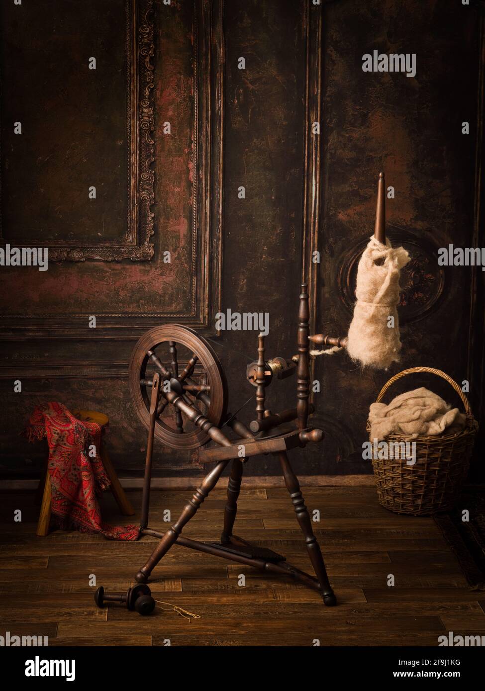 Still life image of an authentic old spinning wheel with real sheep ...