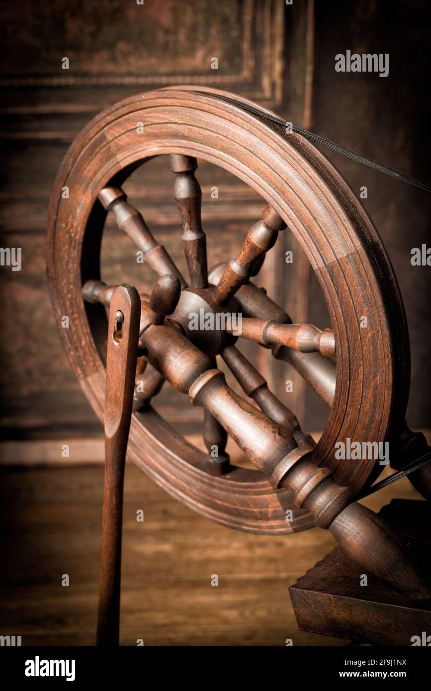 Wooden spinning wheel hi-res stock photography and images - Alamy