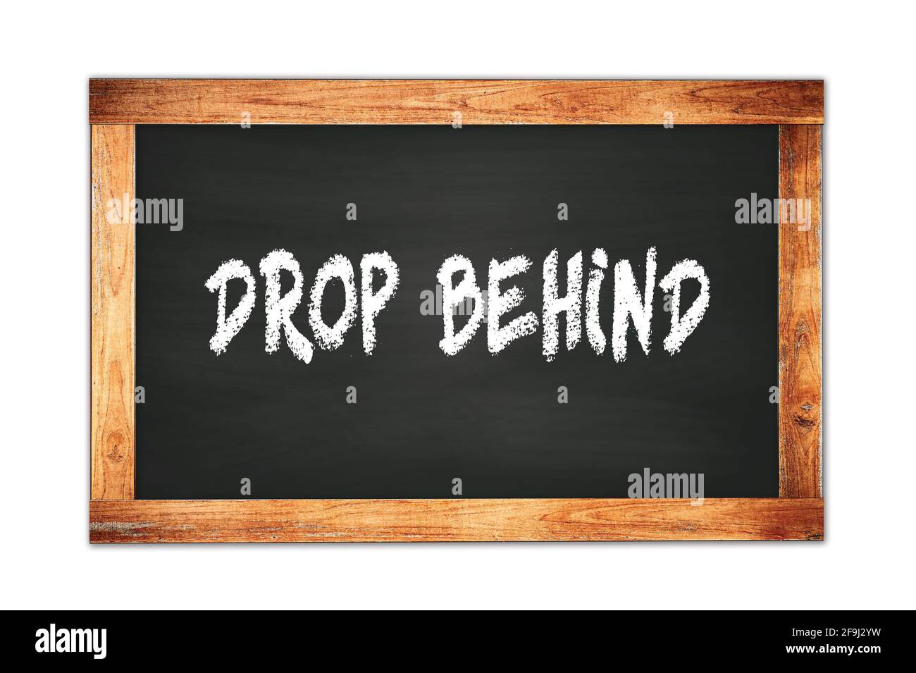 DROP BEHIND text written on black wooden frame school blackboard Stock ...