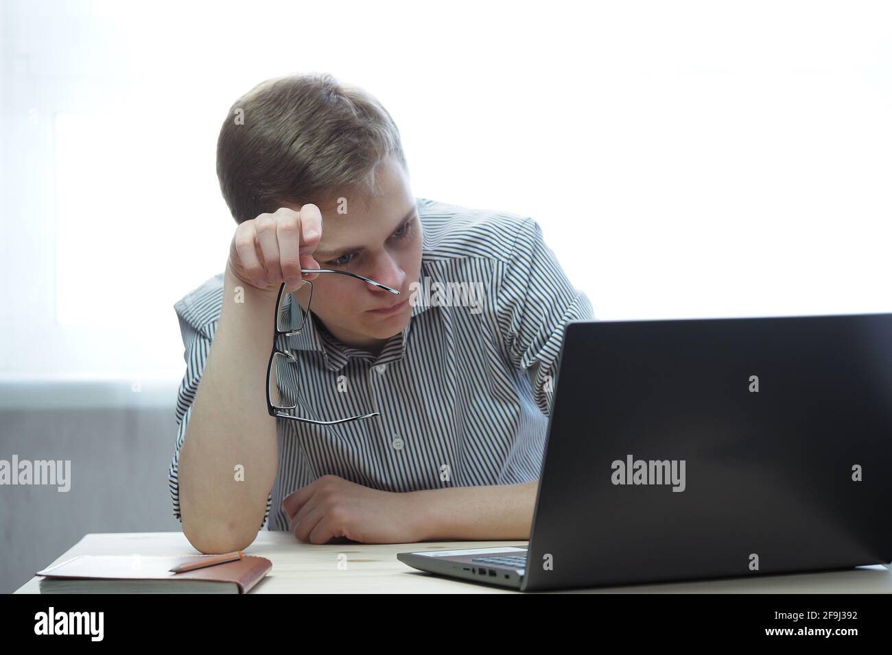 University student laptop behind screen hi-res stock photography and ...