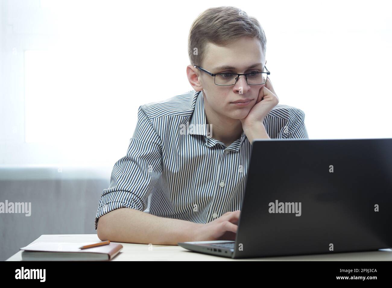 University student laptop behind screen hi-res stock photography and ...