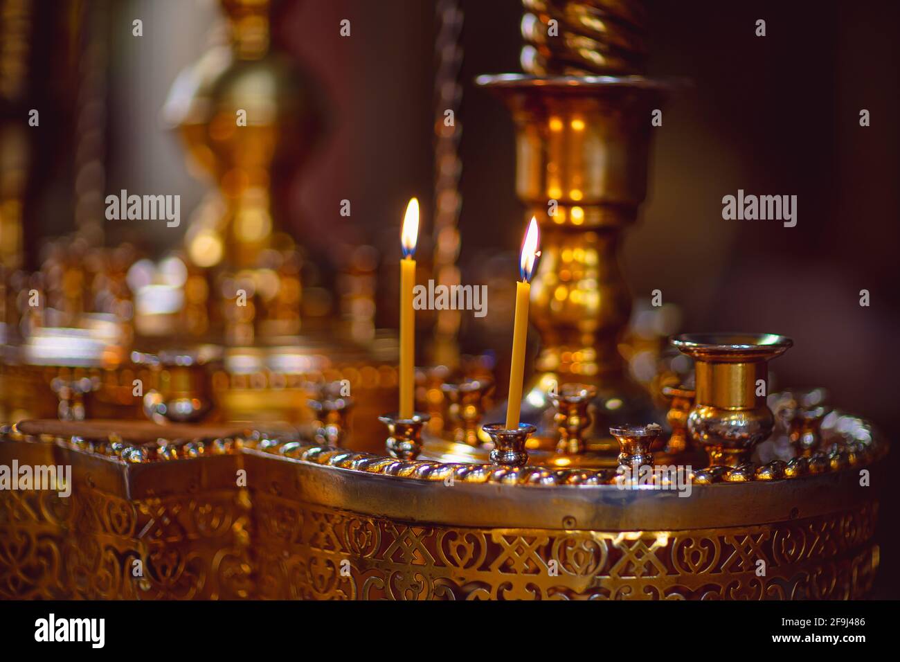 candles in the candlestick in the temple Stock Photo - Alamy