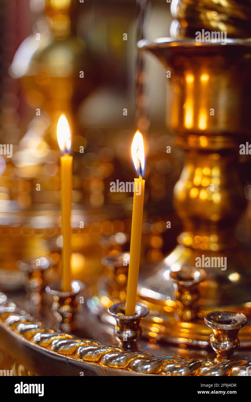candles in the candlestick in the temple Stock Photo - Alamy