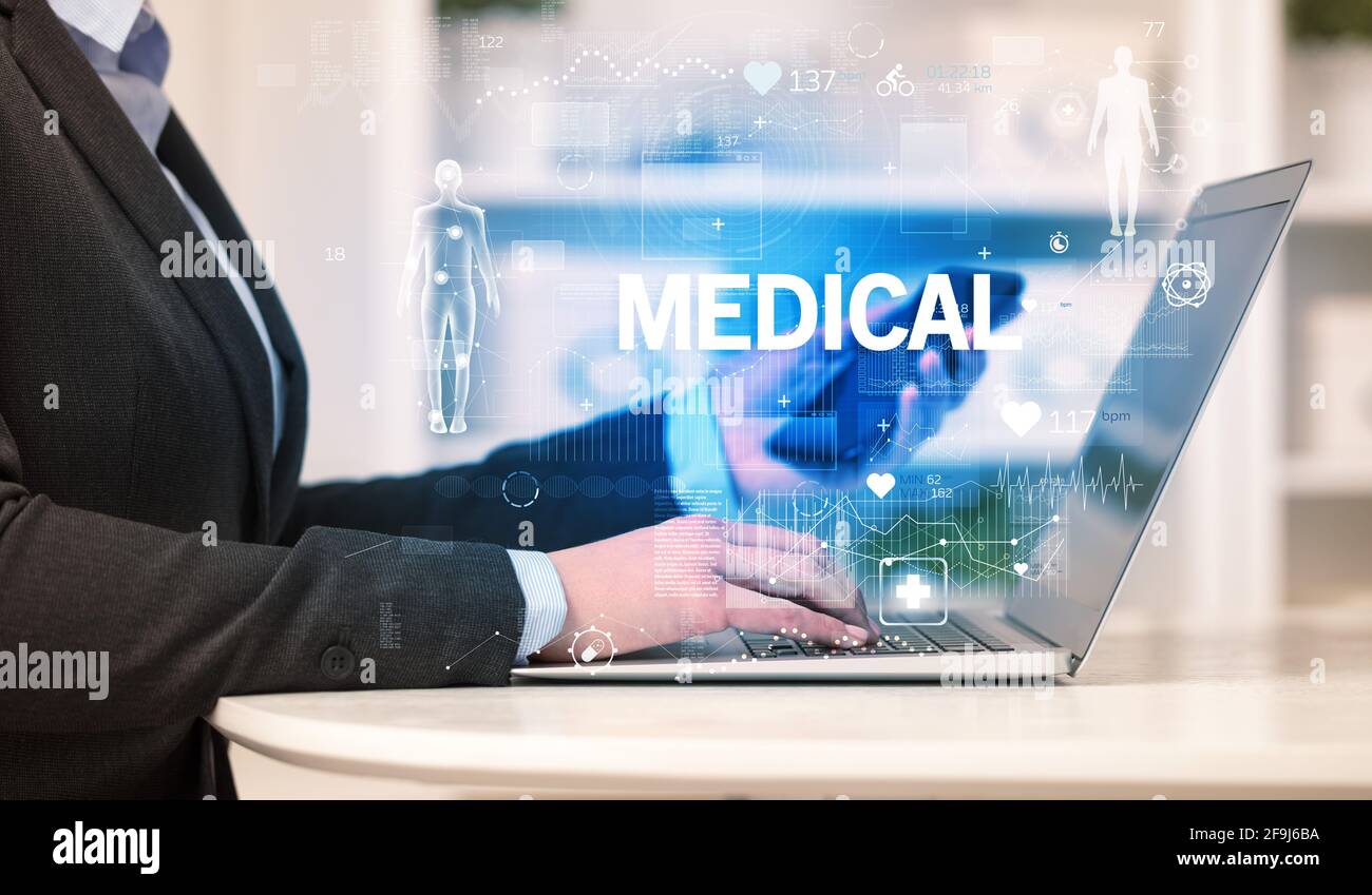 Doctor working a health check Stock Photo - Alamy