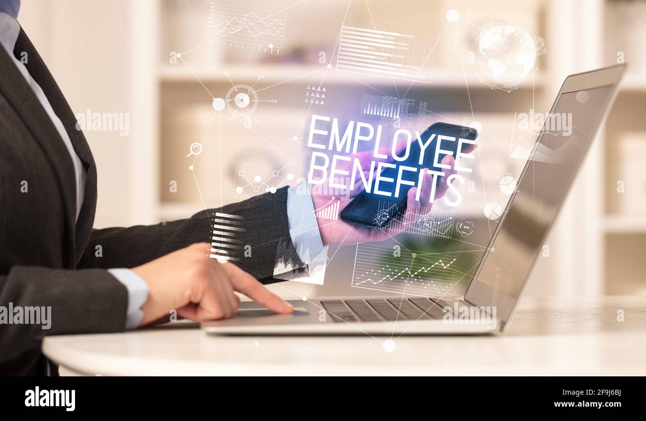 Side view of a business person working on laptop Stock Photo - Alamy