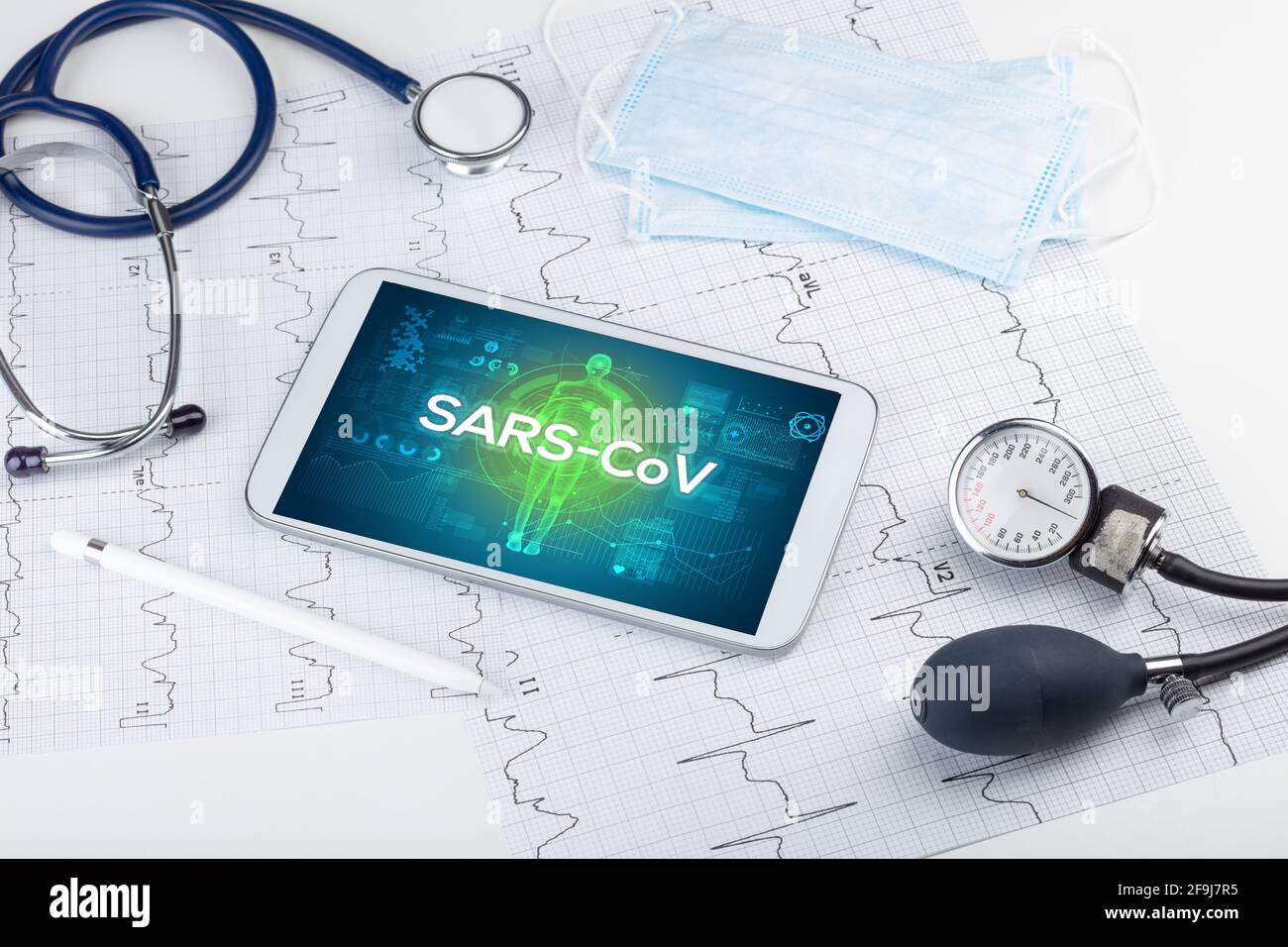 Tablet pc and doctor tools Stock Photo - Alamy