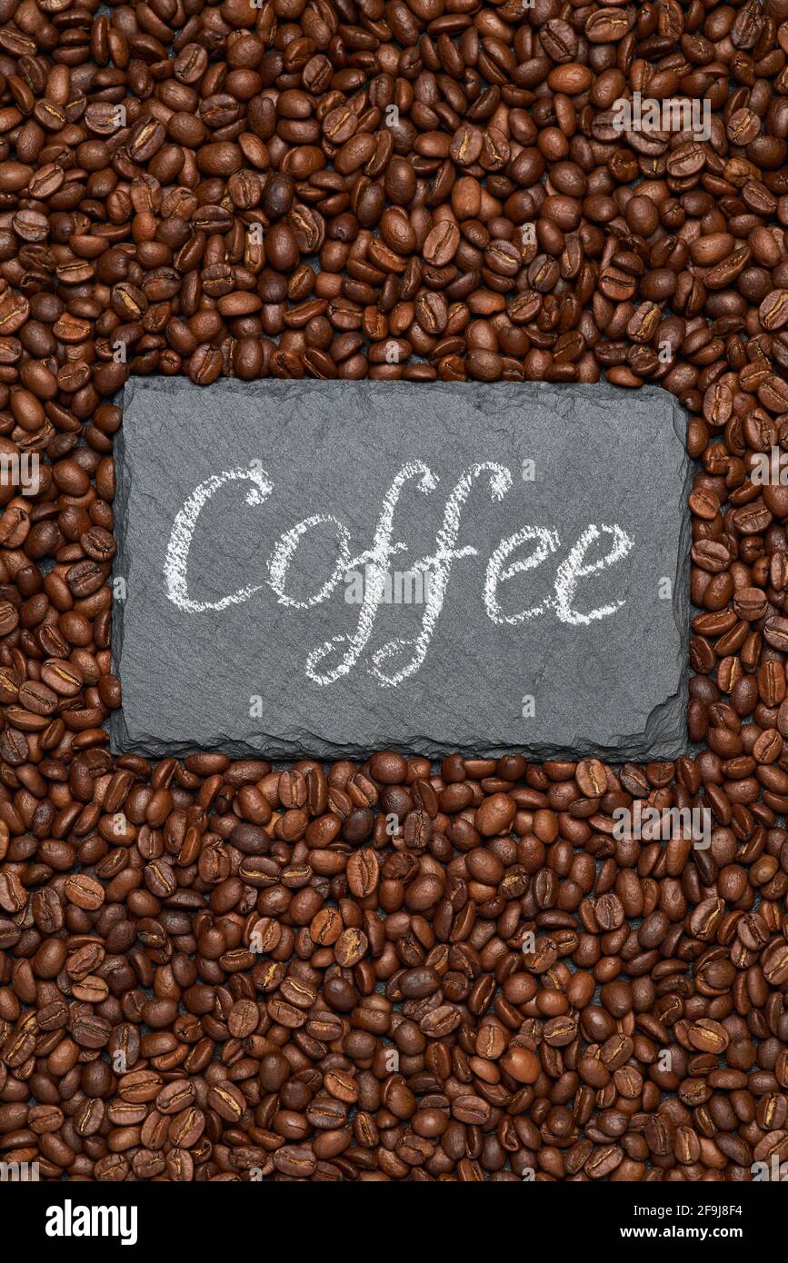 Background or texture made of roasted brown coffee beans and stone ...