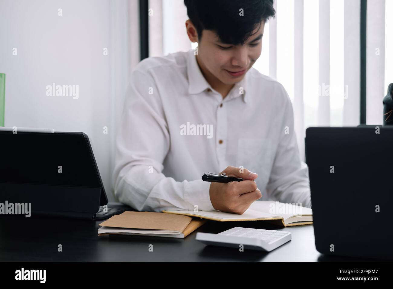 Taking pen hi-res stock photography and images - Alamy