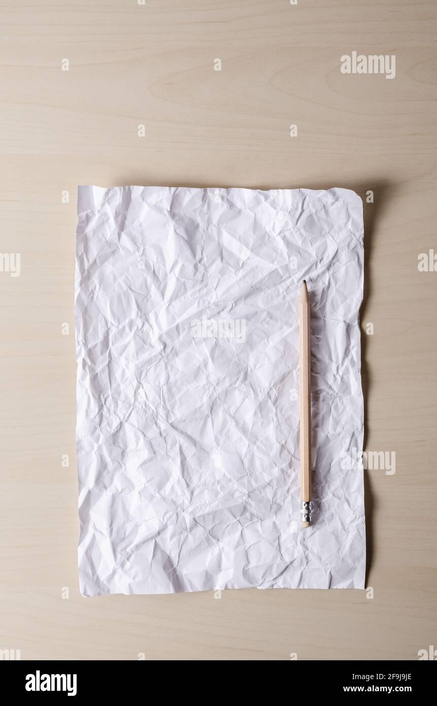 Crumpling A Sheet Of Paper