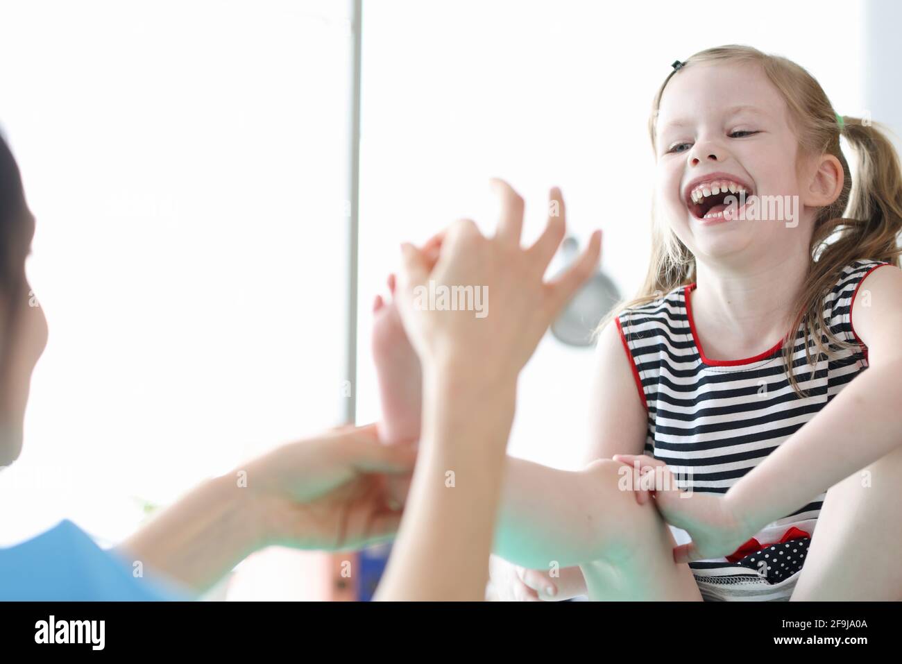 Tickling feet hi-res stock photography and images - Alamy