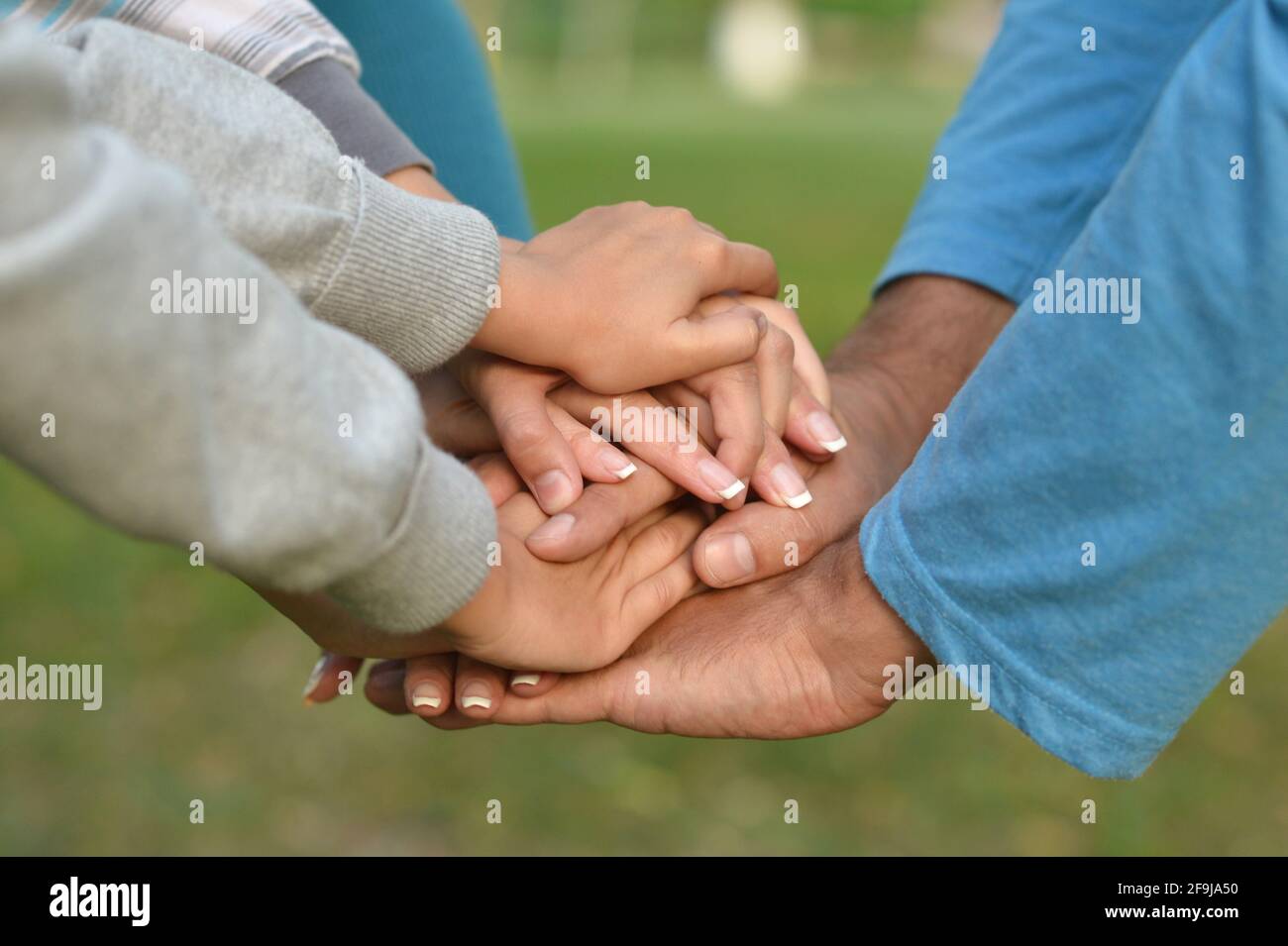 Putting palms together hi-res stock photography and images - Alamy