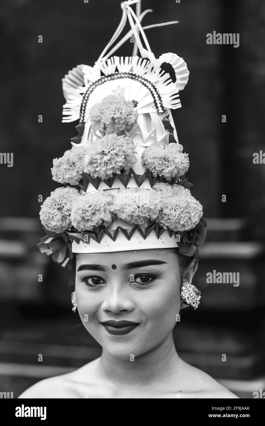 A Young Balinese Hindu Female In Festival Costume At The Batara Turun ...