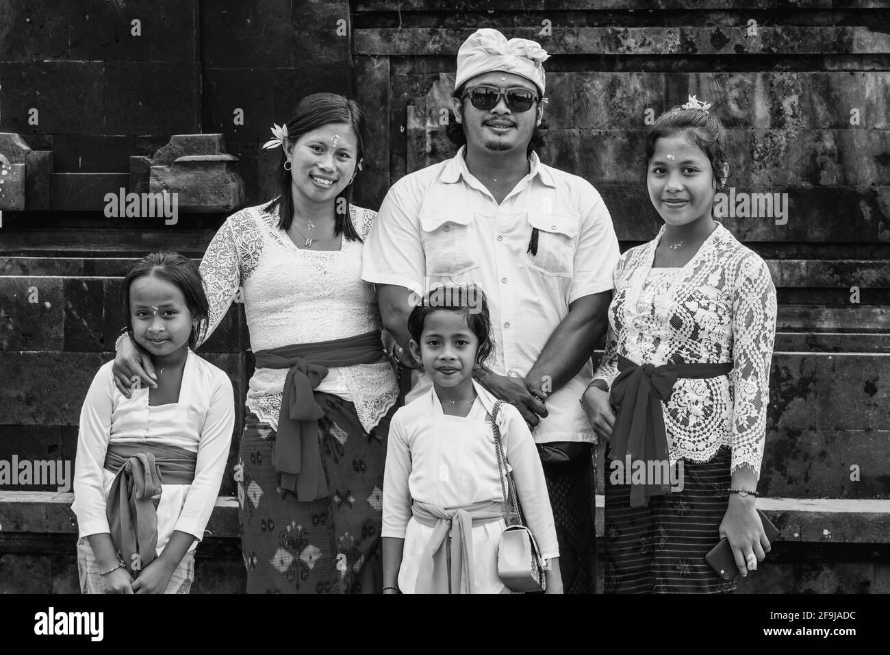 A Balinese Hindu Family Pose For Photos At The Batara Turun Kabeh ...