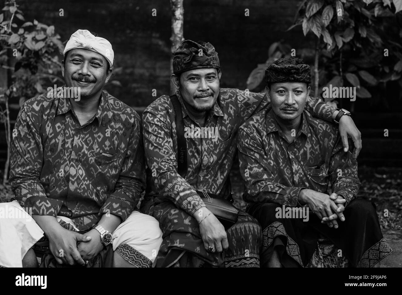 A Group Of Balinese Men In Traditional Dress At A Hindu Festival, Tirta ...