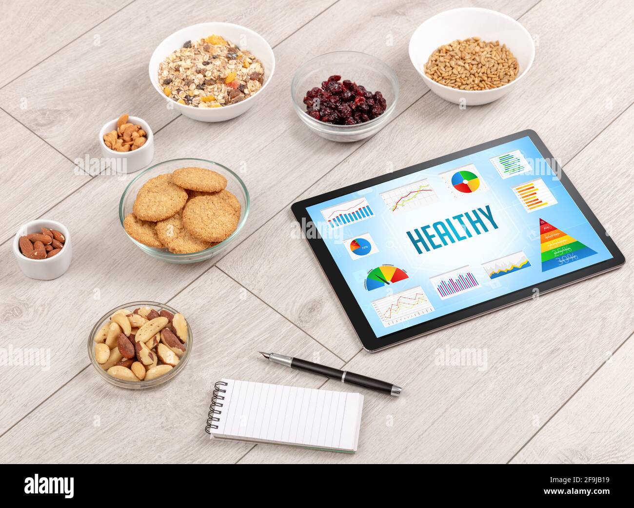 Organic food and tablet pc Stock Photo - Alamy