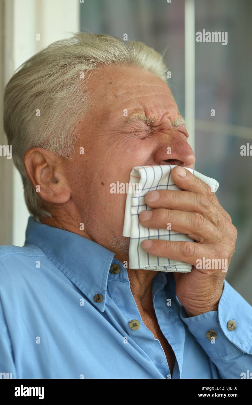 Portrait of a sad sick senior man Stock Photo - Alamy