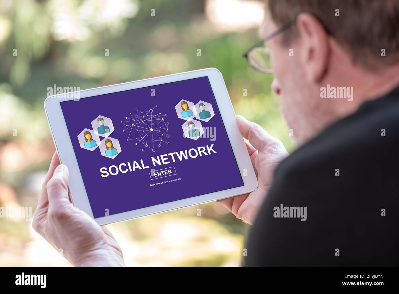 Tablet screen displaying a social network concept Stock Photo - Alamy