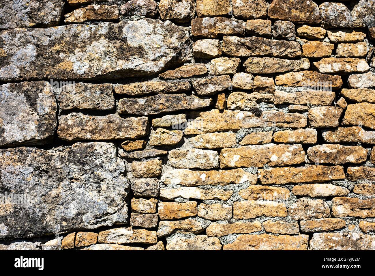 Closeup of an old textured brick wall under the sunlight Stock Photo ...