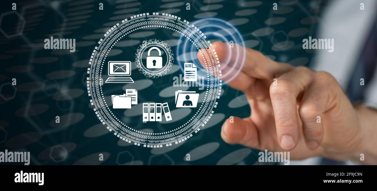 Man touching a data protection concept on a touch screen with his ...