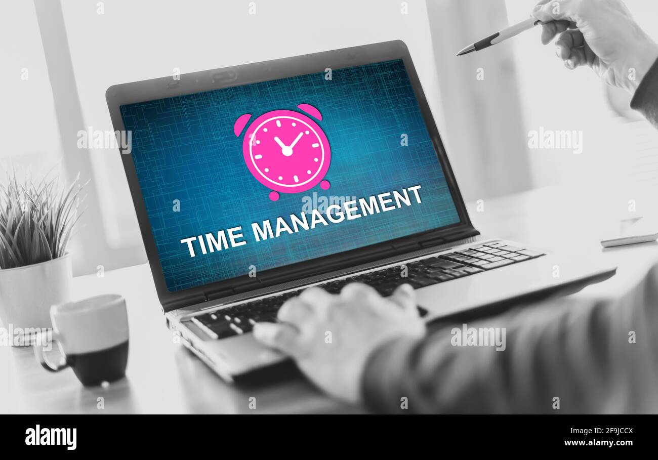 Laptop screen displaying a time management concept Stock Photo - Alamy
