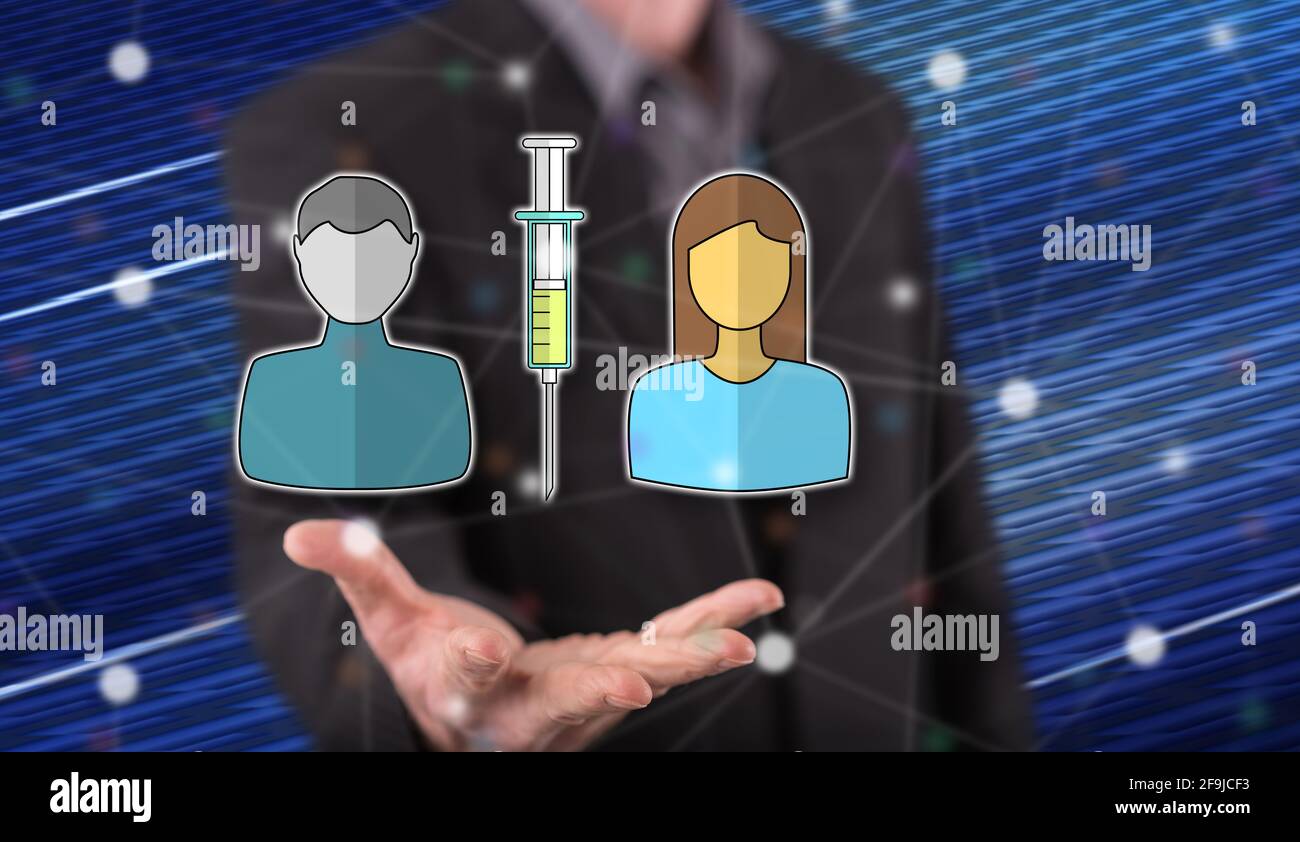 Vaccination concept above the hand of a man in background Stock Photo ...