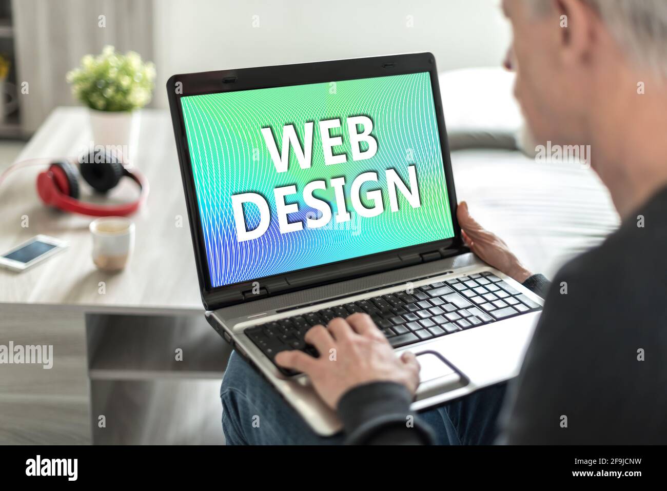 Laptop screen displaying a web design concept Stock Photo - Alamy