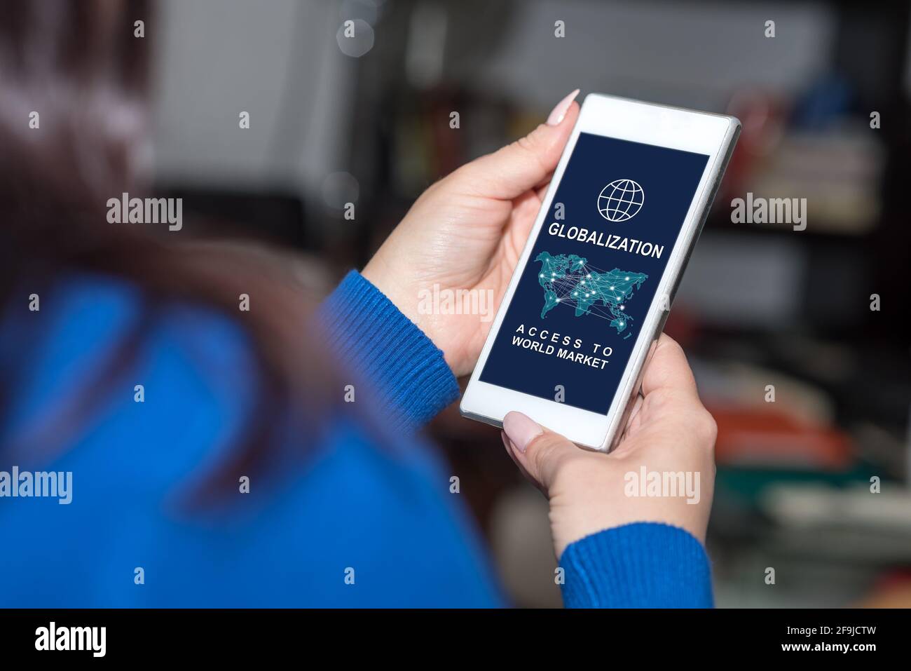 Smartphone screen displaying a globalization concept Stock Photo - Alamy
