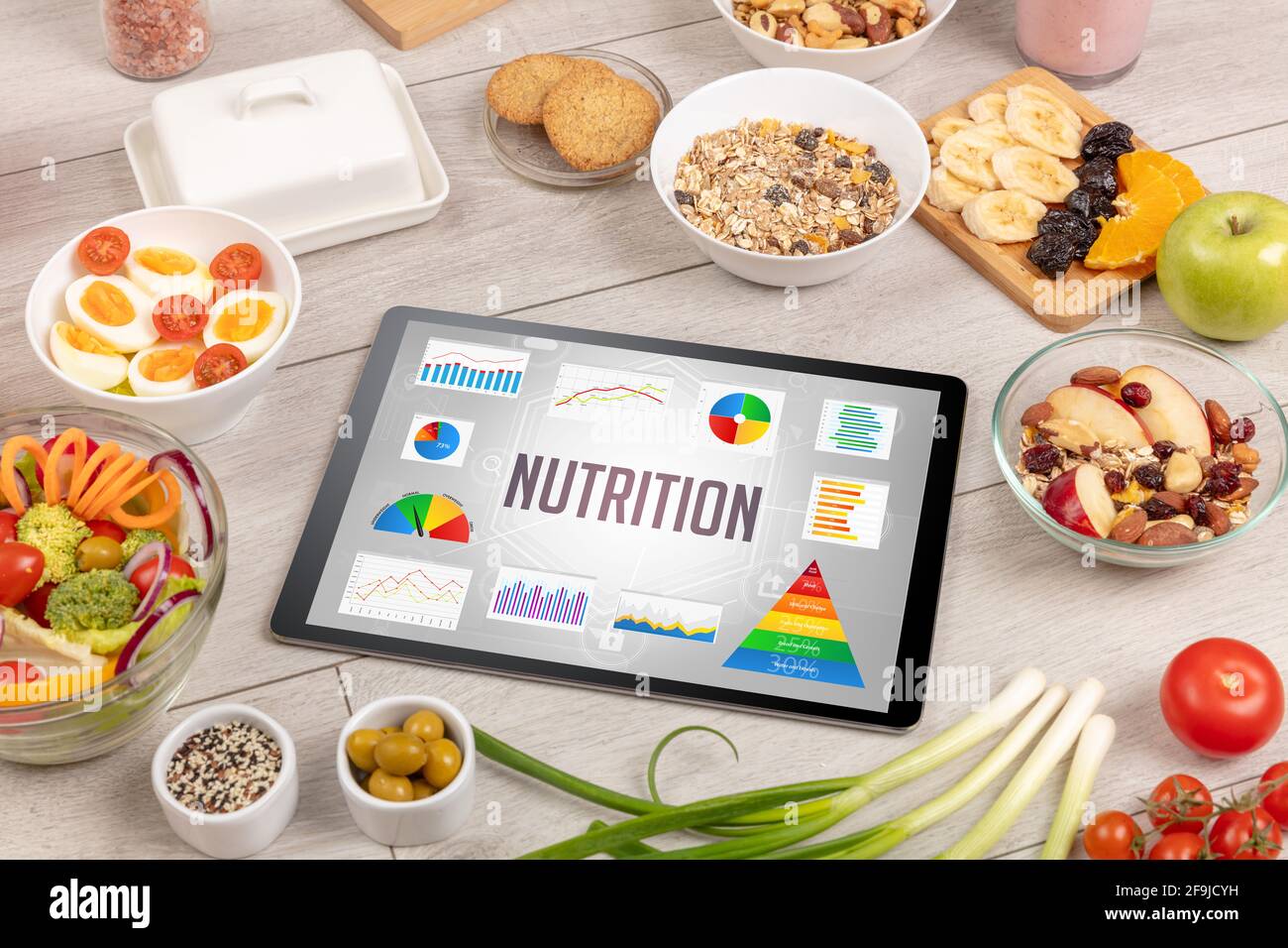 Organic food and tablet pc Stock Photo - Alamy