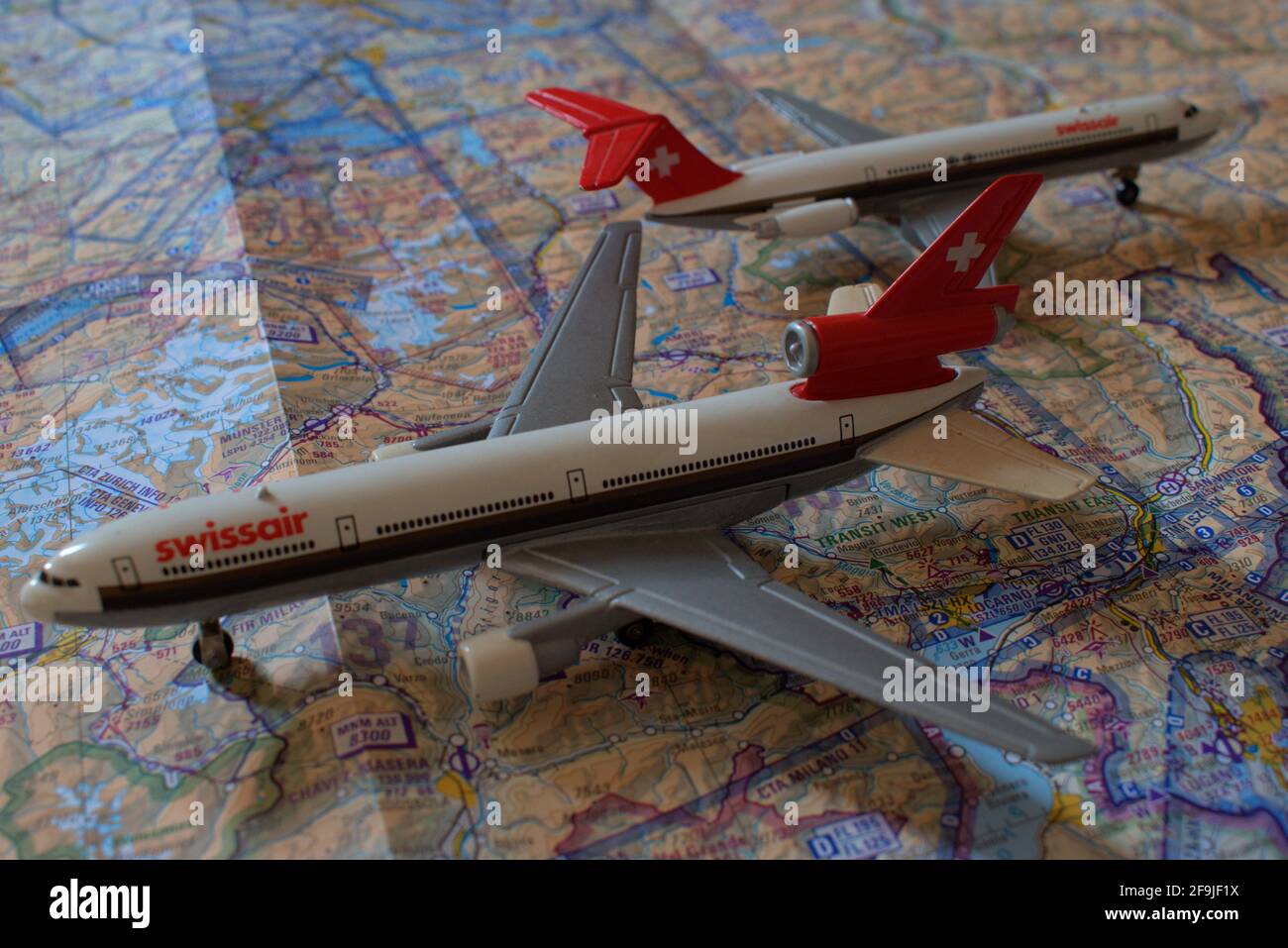 Swissair aircraft toys positioned on an air navigation map 25.3.2021 ...