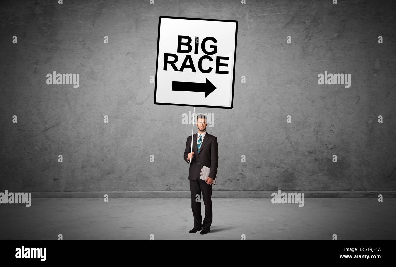 business person holding a traffic sign Stock Photo - Alamy